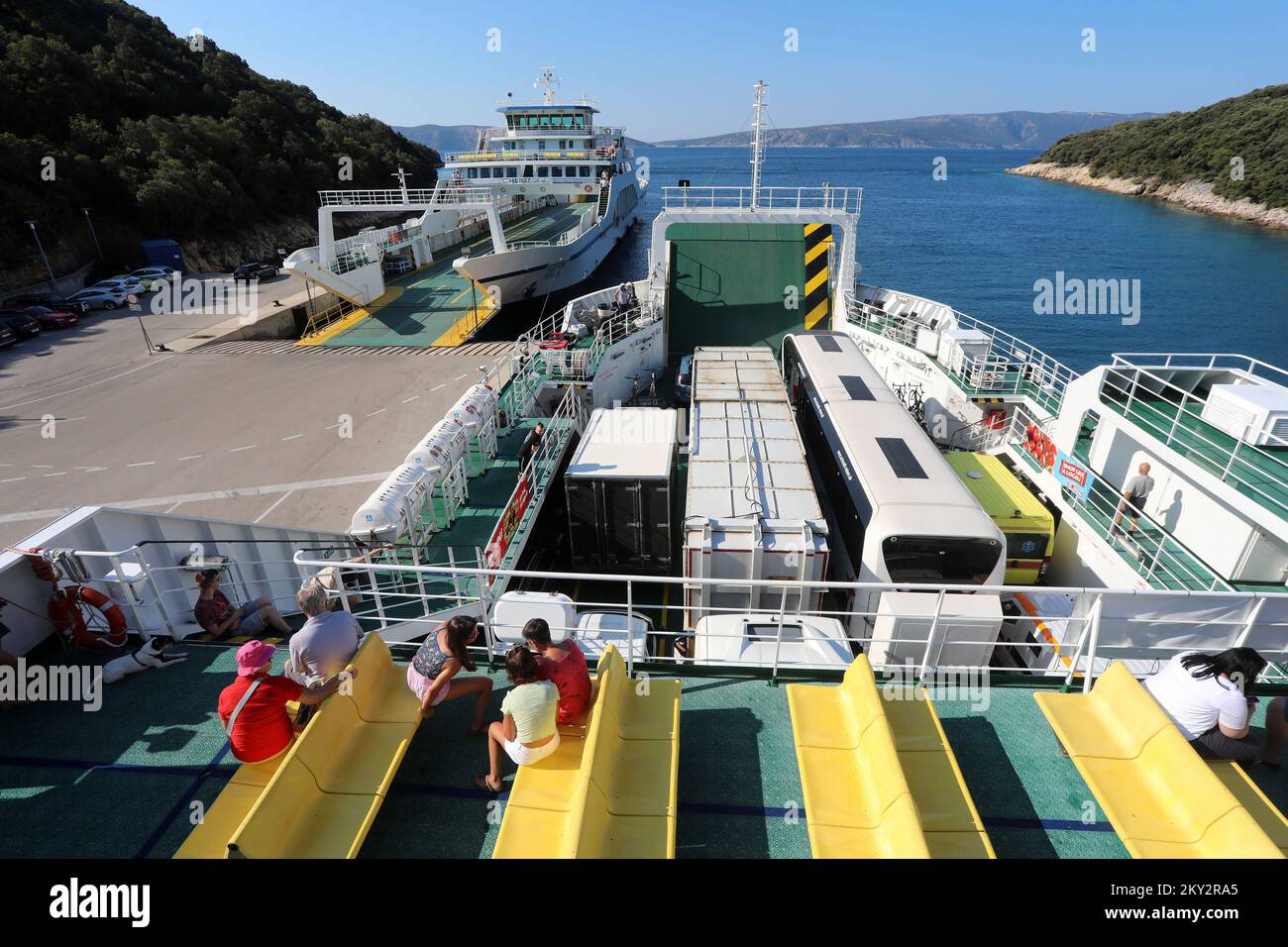Tourists board the Jadrolinija Kornati and Ilovik ferries at the ...