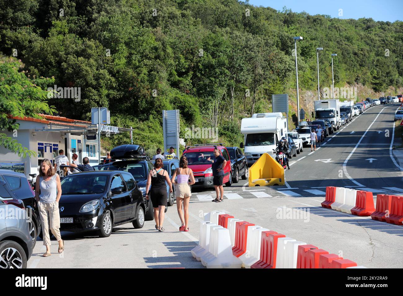 Tourists board the Jadrolinija Kornati and Ilovik ferries at the ...