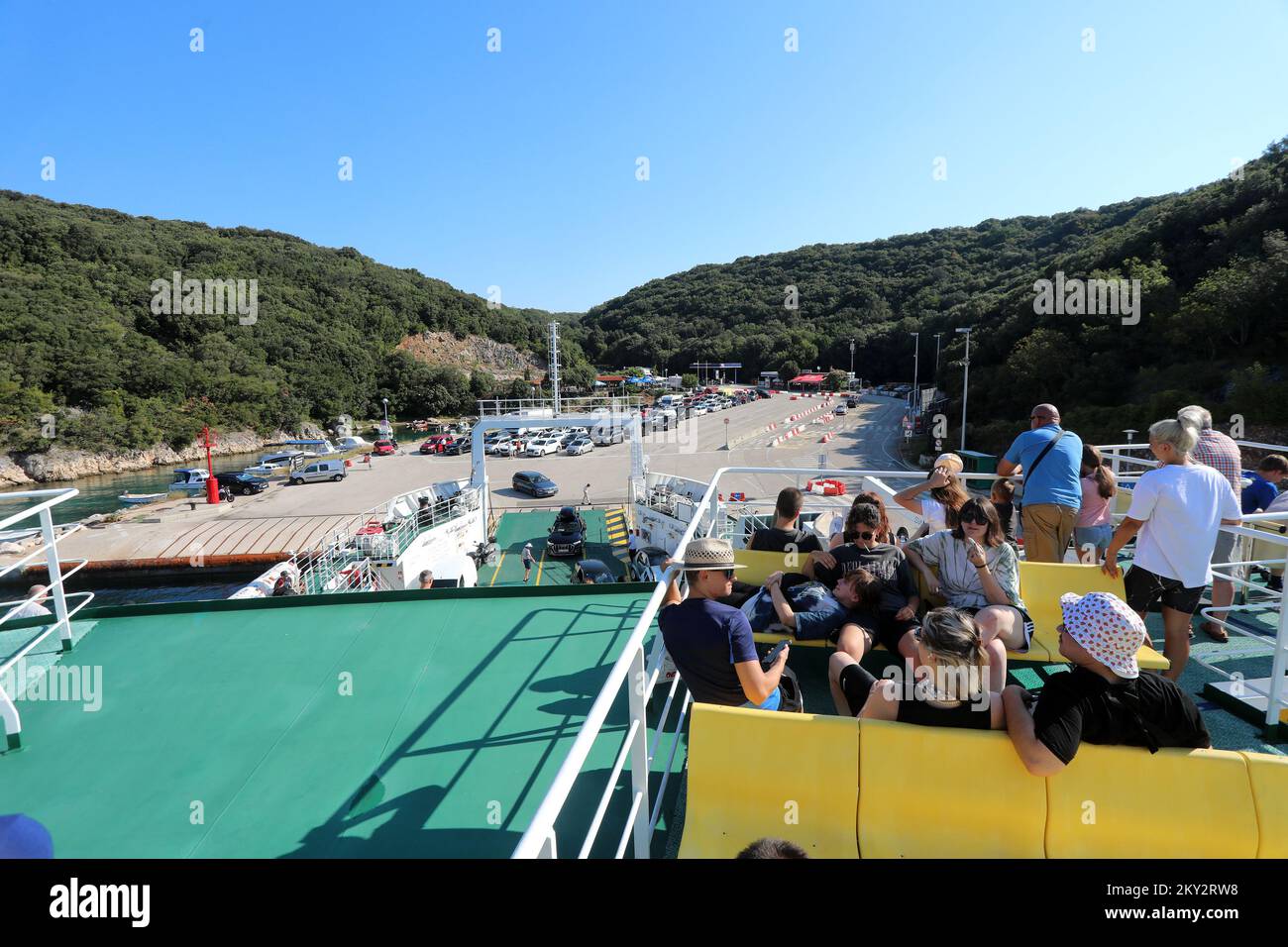 Tourists board the Jadrolinija Kornati and Ilovik ferries at the ...
