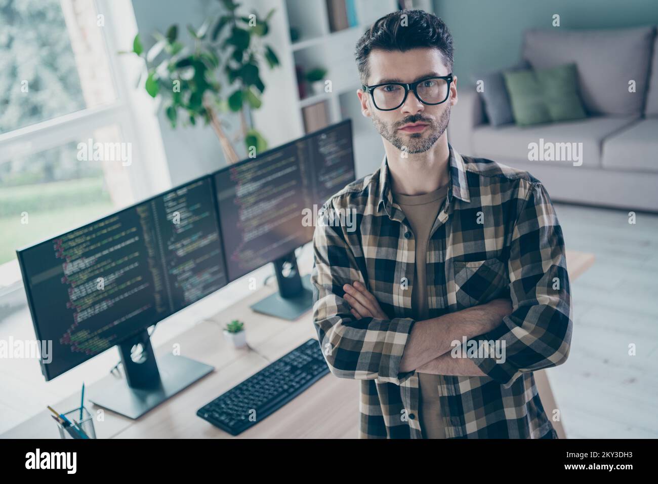 Photo of serious confident programmer wear spectacles arms folded ...