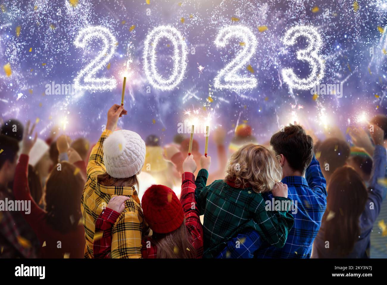 Happy new year. Family watching fireworks. Parents and kids celebrate ...