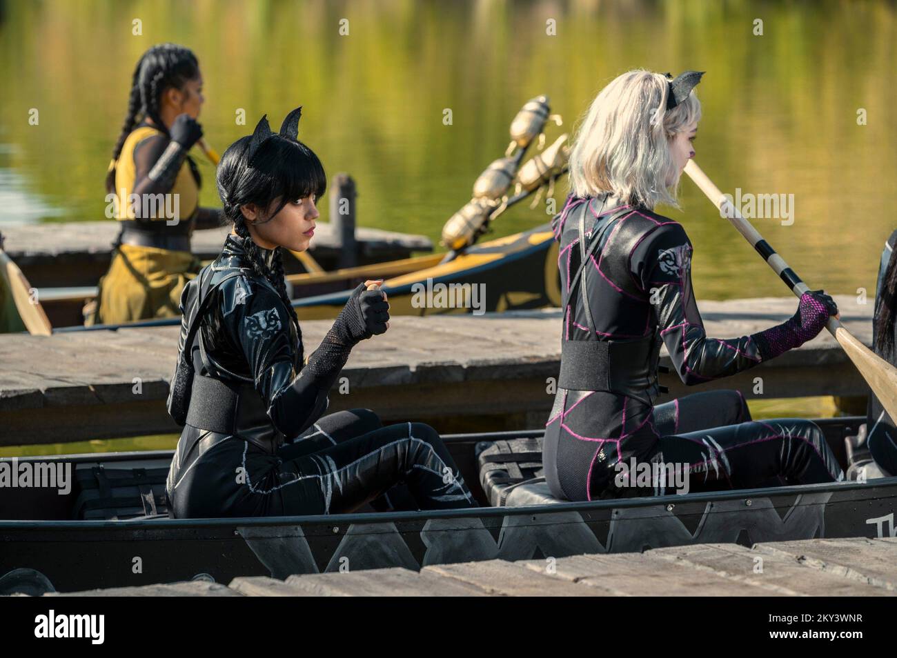 WEDNESDAY, from left: Jenna Ortega, Emma Myers (back to camera), 'Woe ...