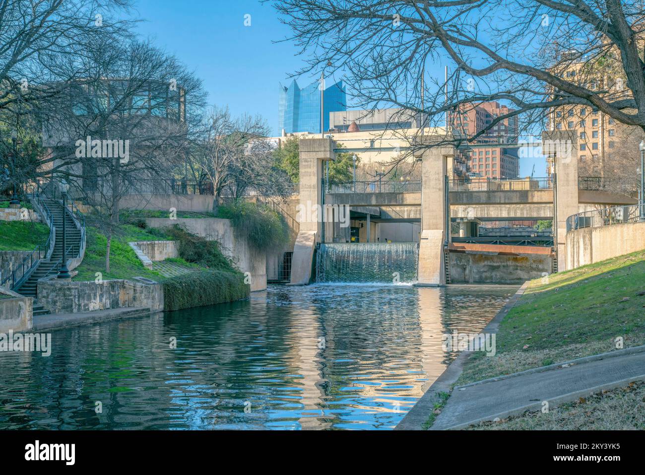Beautiful scenery of a canal and park at San Antonio River Walk in ...