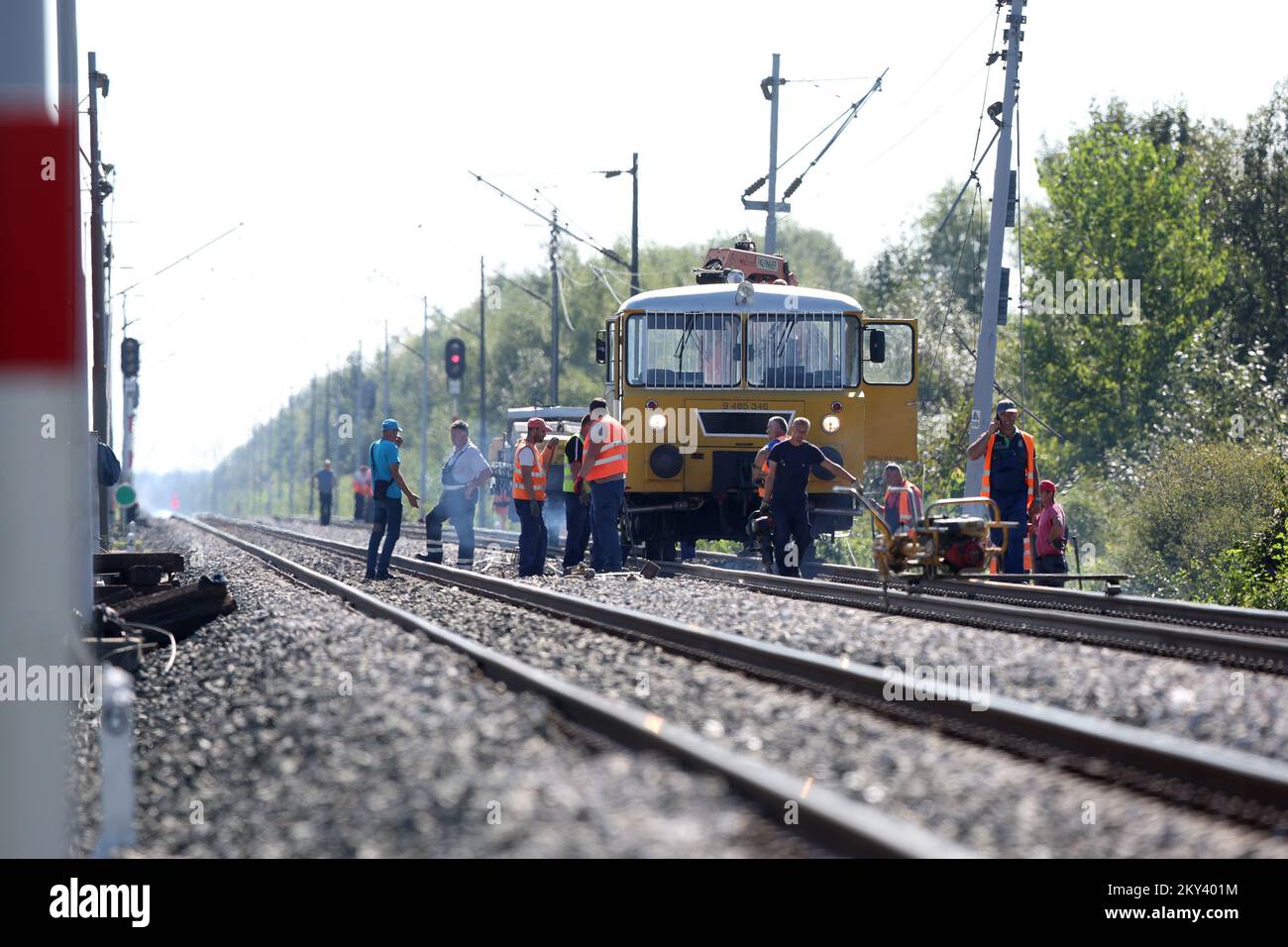 Rescue workers work at the crash site where two trains collided in ...