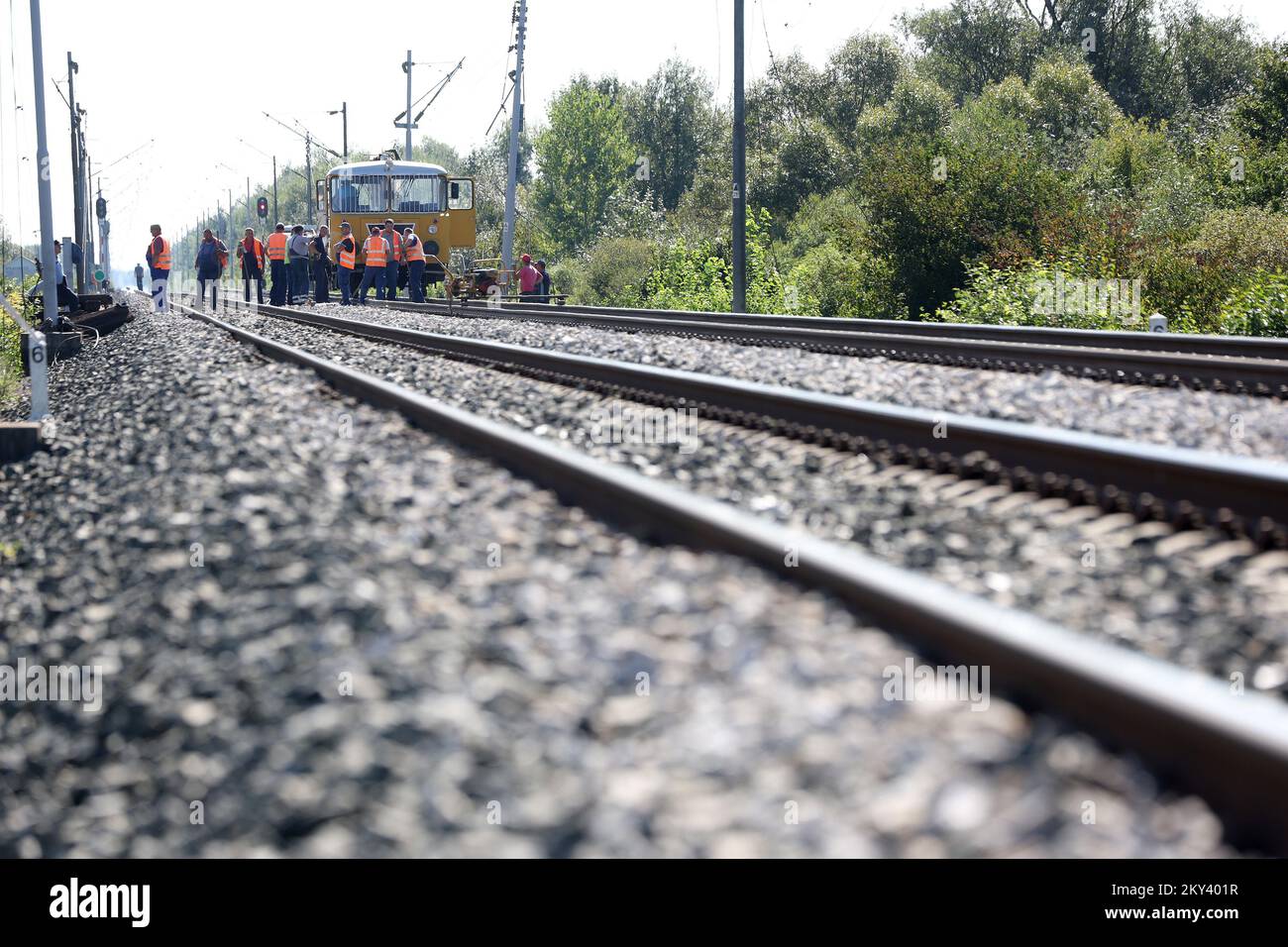 Rescue workers work at the crash site where two trains collided in ...