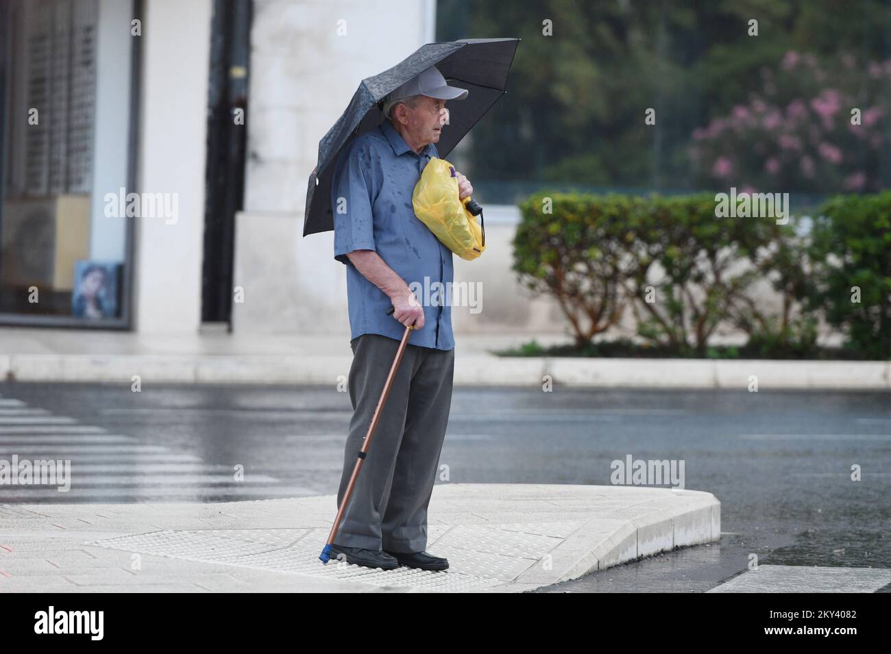 Rainy morning on the city streets in Sibenik, Croatia on September 11 ...