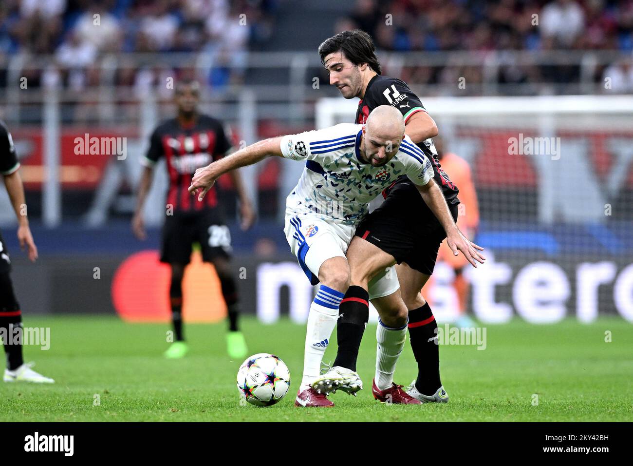 MILAN, ITALY - SEPTEMBER 14: Sandro Tonali of AC Milan and Josip Misic ...