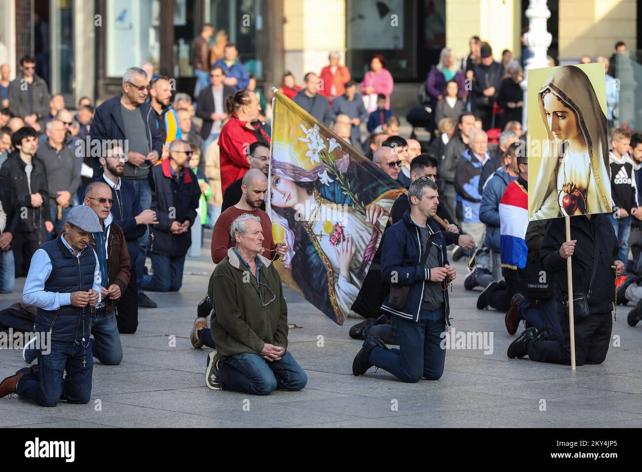 Men pray the rosary at Ban Josip Jelacic Square in Zagreb, Croatia on ...