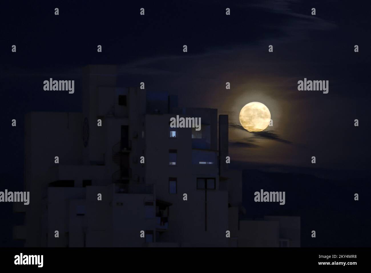 A full moon is seen in the sky in Split, Croatia on October 10, 2022 ...