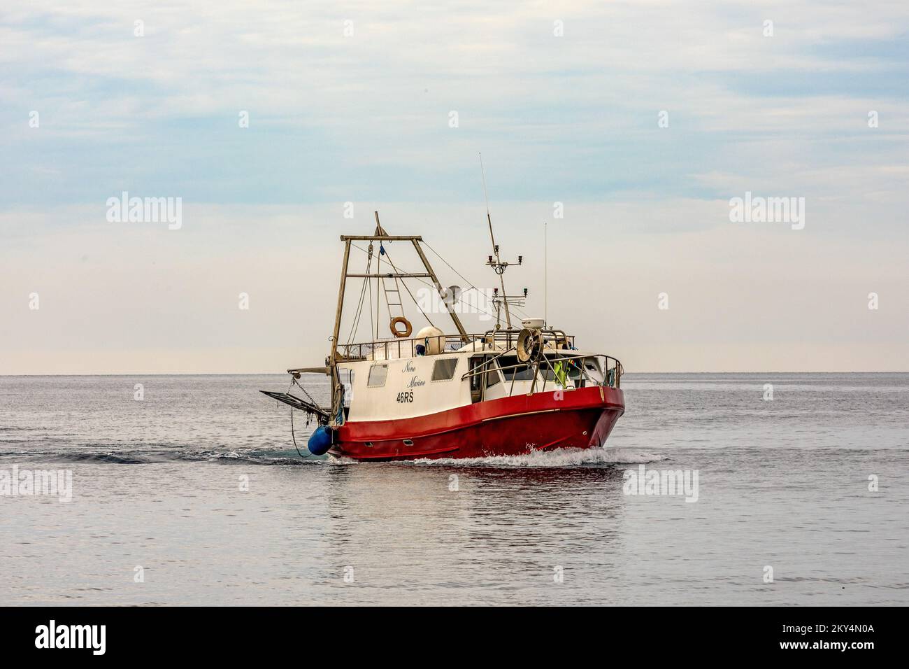 A fishing boat returning from the sea in Pula, Croatia on October 8 ...