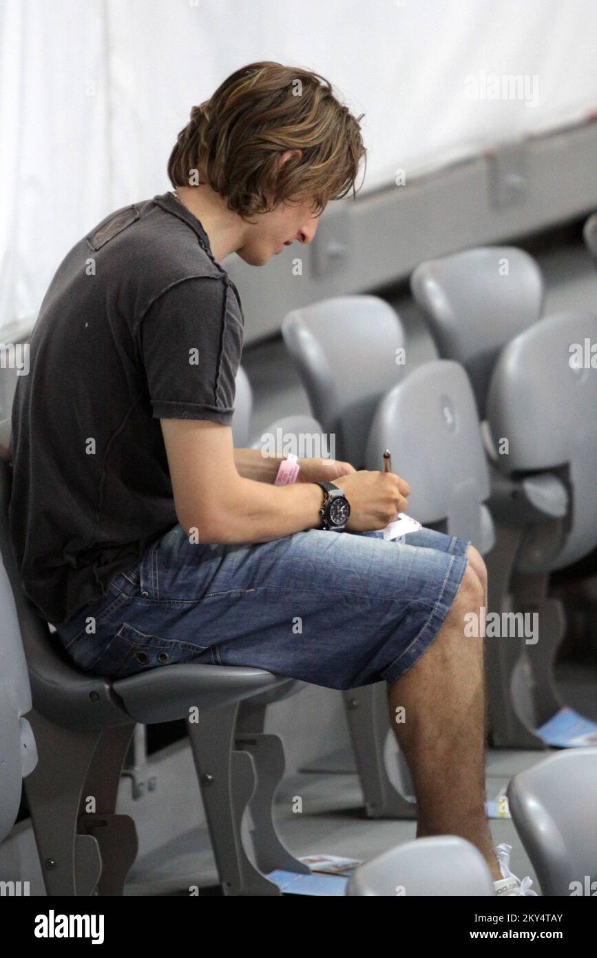 Tottenham Hotspur's Luka Modric signs autographs for fans Stock Photo ...