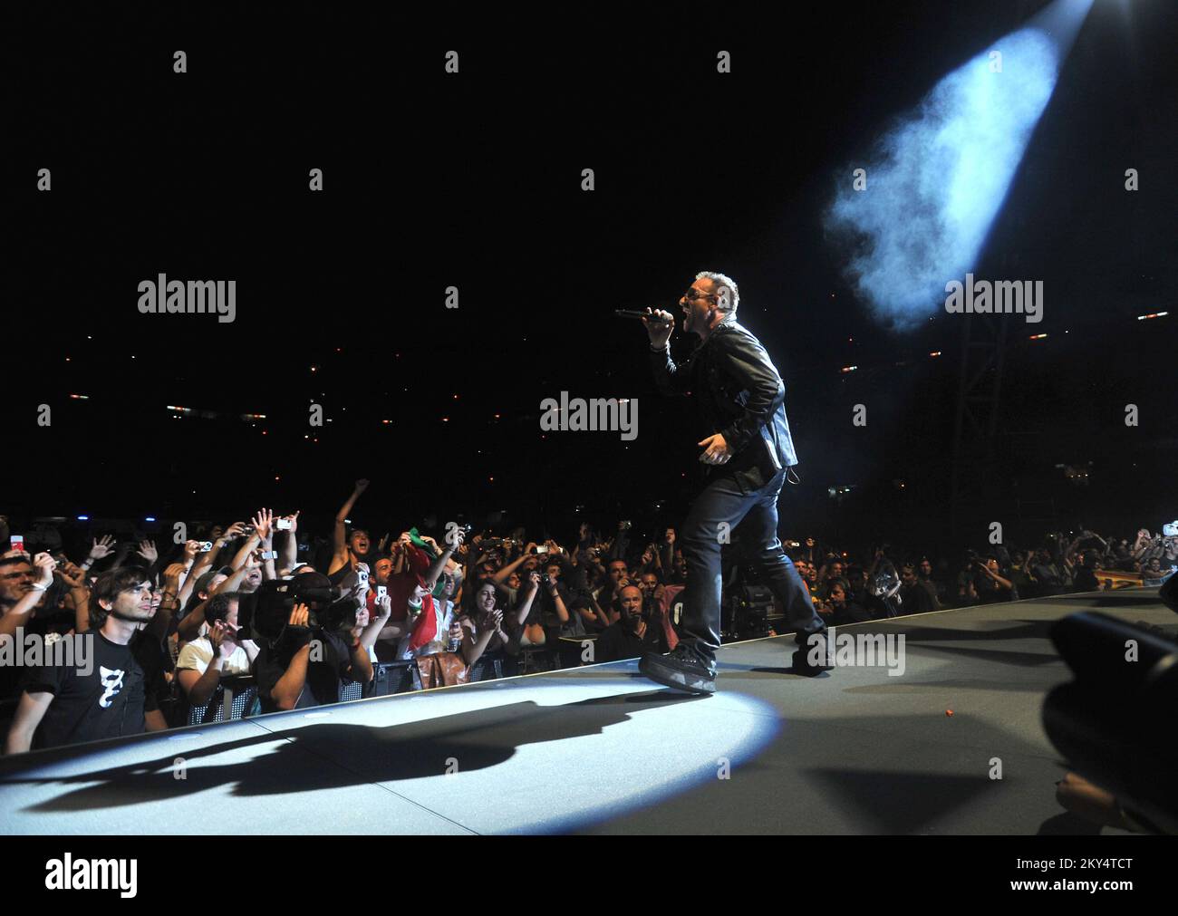 U2's Bono performs during their 360 world tour at the Camp Nou stadium ...