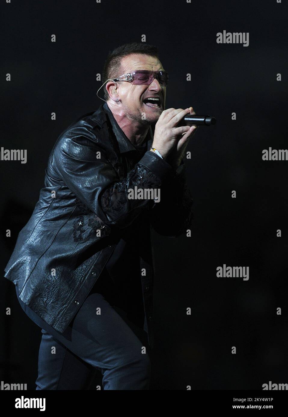 Bono performing on stage at the Maksimir Stadium in Zagreb Stock Photo ...