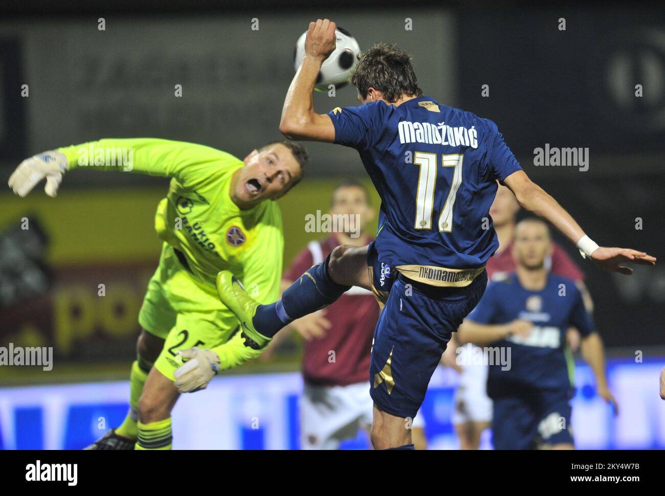 Mario Mandzukic scores a goal past Hearts goalkeeper Marian Kello Stock ...