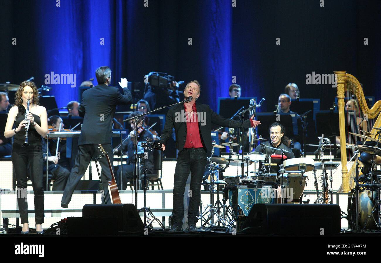 Sting performing on stage with London's Royal Philharmonic Orchestra at ...