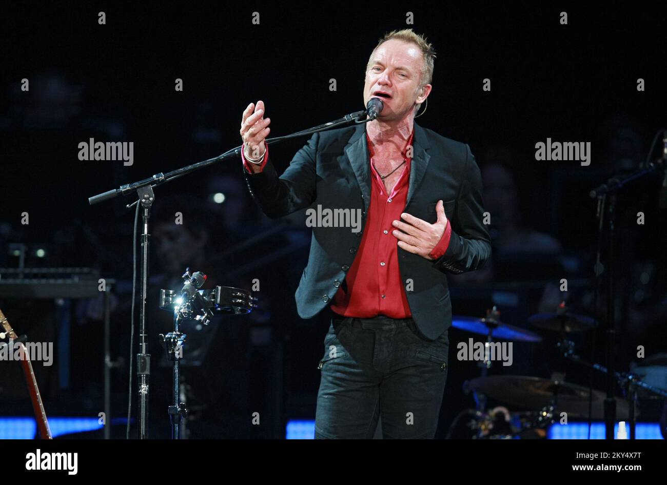 Sting performing on stage with London's Royal Philharmonic Orchestra at ...