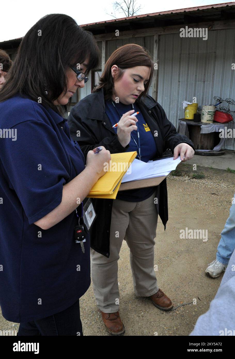 Post Disaster Assessment Team Records Details from a Resident ...