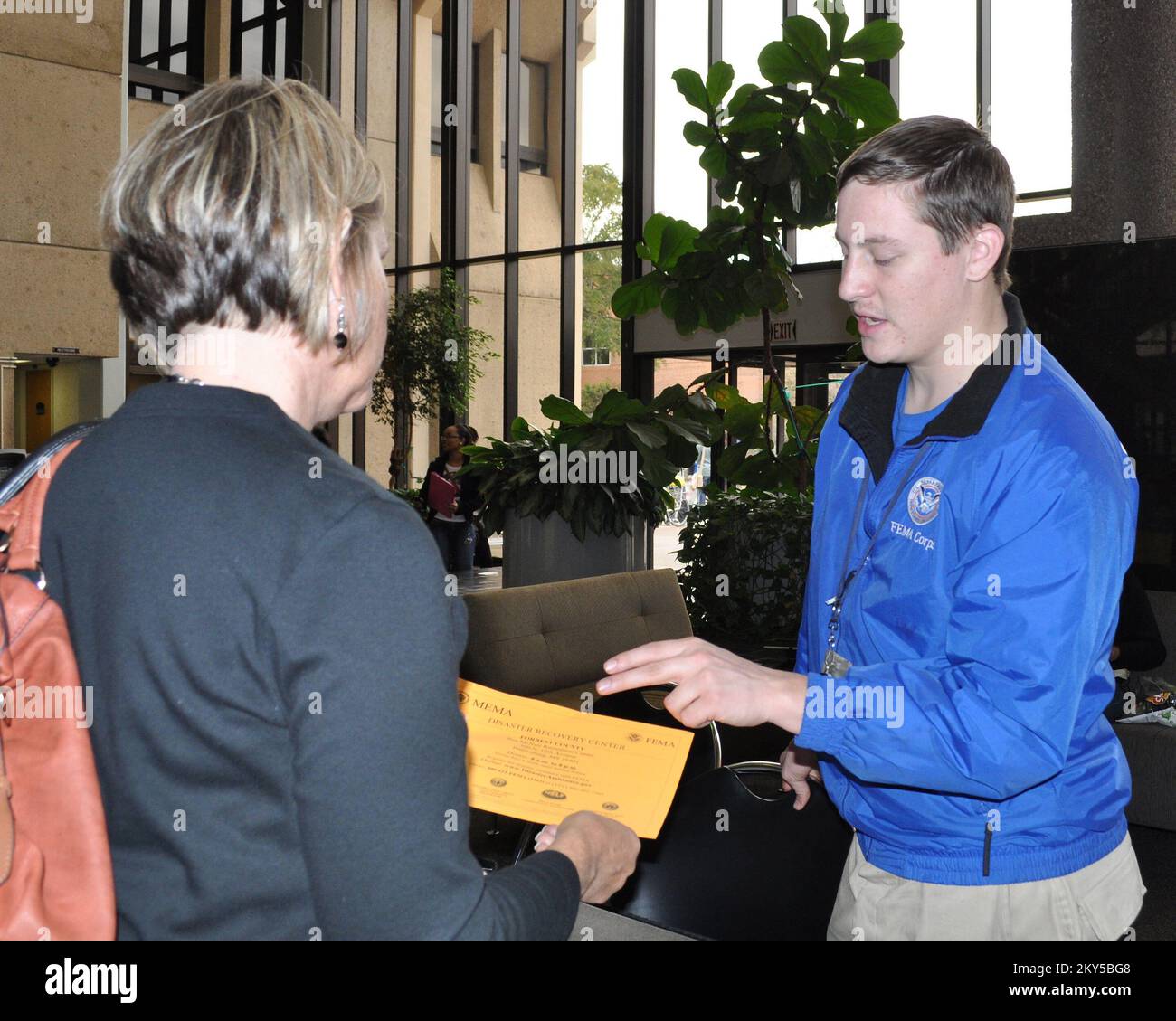 Questions are Answered by FEMA Corps at a Mini-Disaster Recovery ...