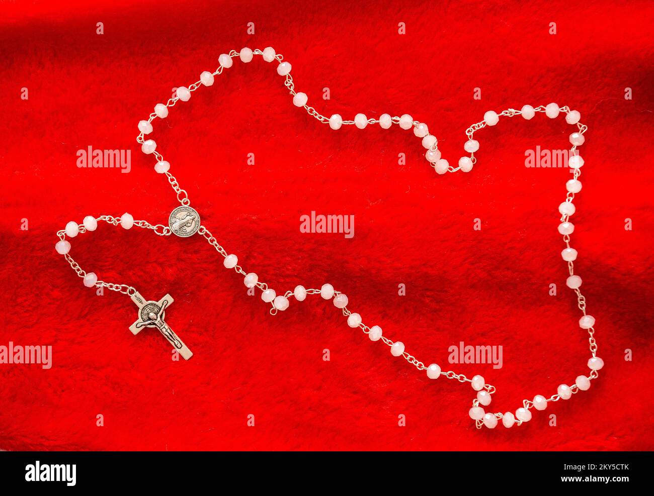 Catholic rosary and crucifix for first communion boy Stock Photo - Alamy