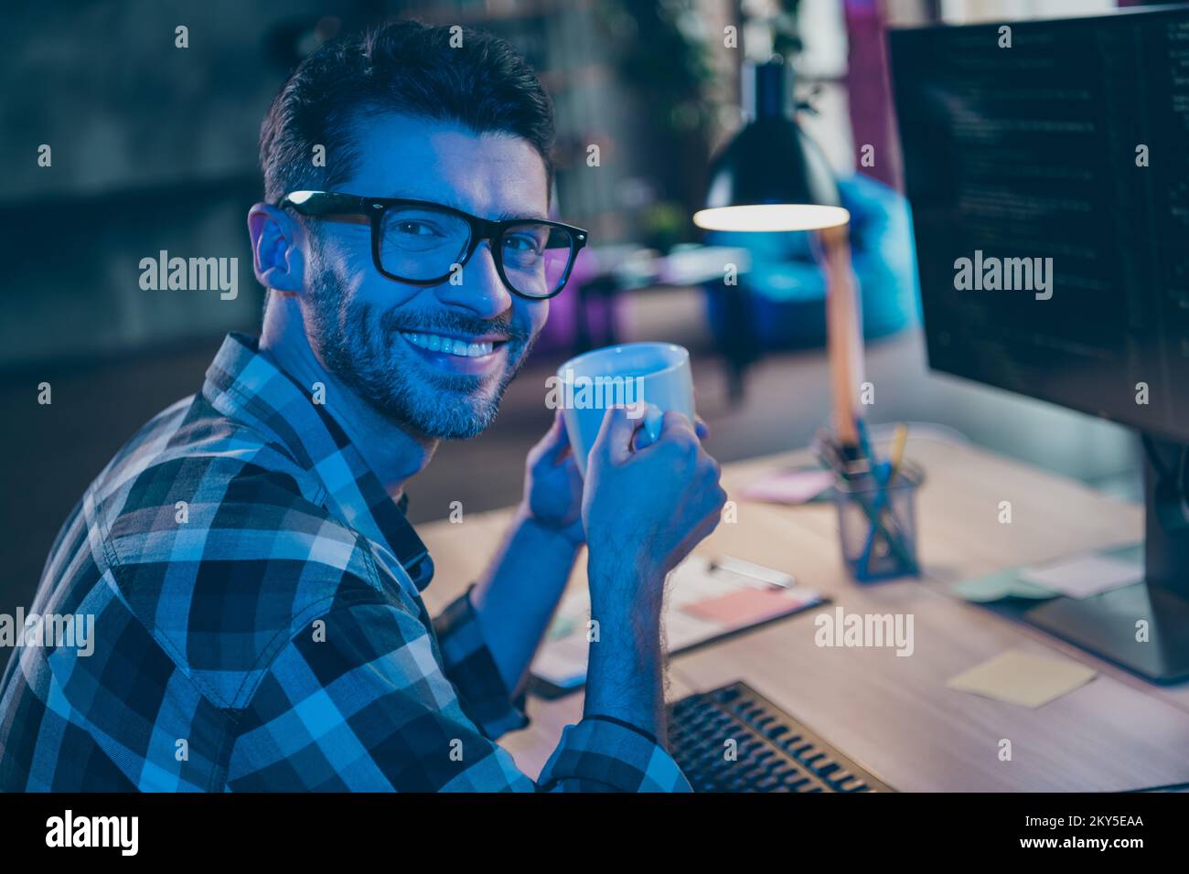 Profile portrait of happy intelligent hacker guy sitting chair hold hot ...
