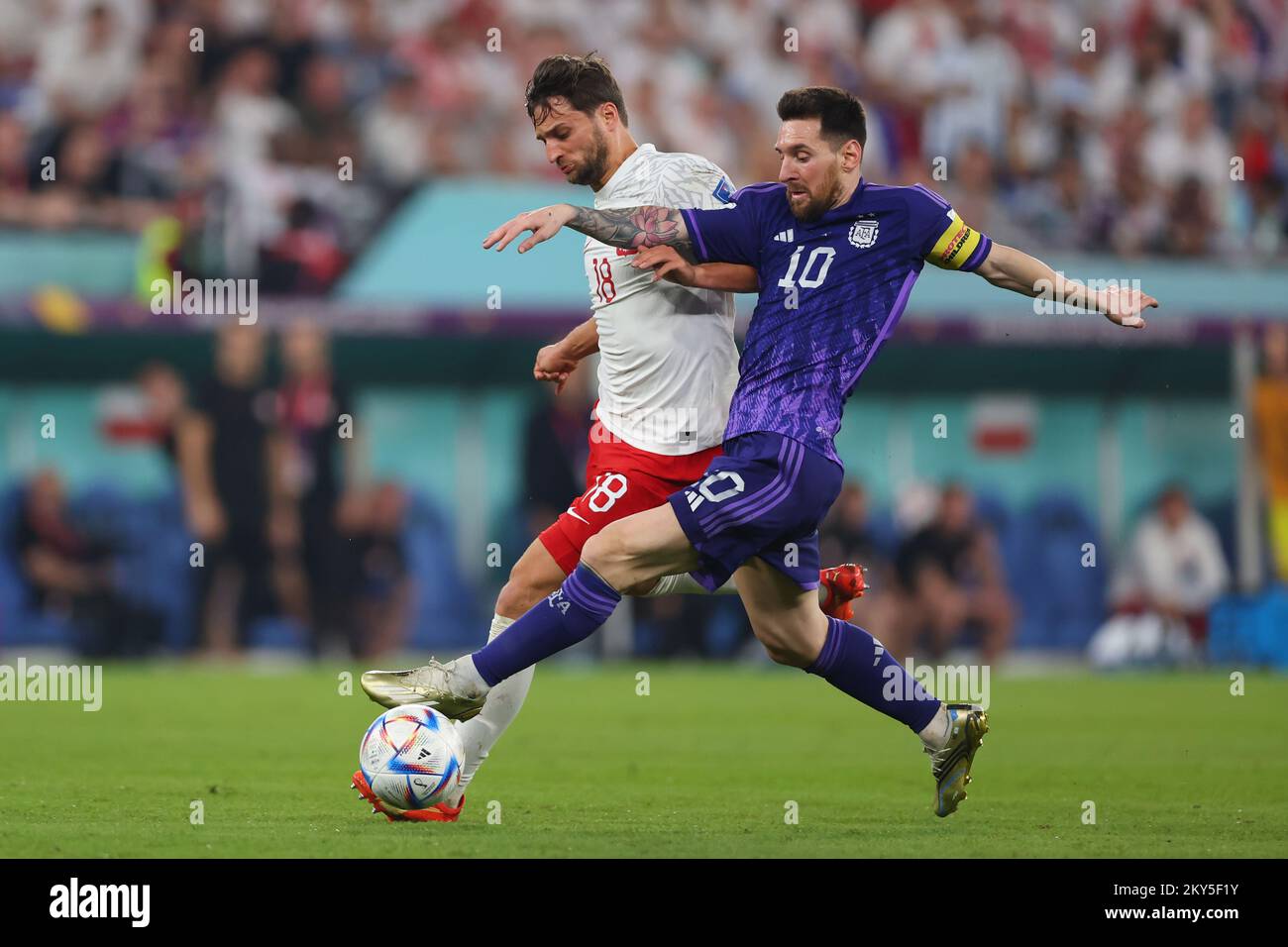 Doha, Qatar. 30th Nov, 2022. (L to R) Bartosz Bereszynski (POL), Lionel Messi (ARG) Football ...
