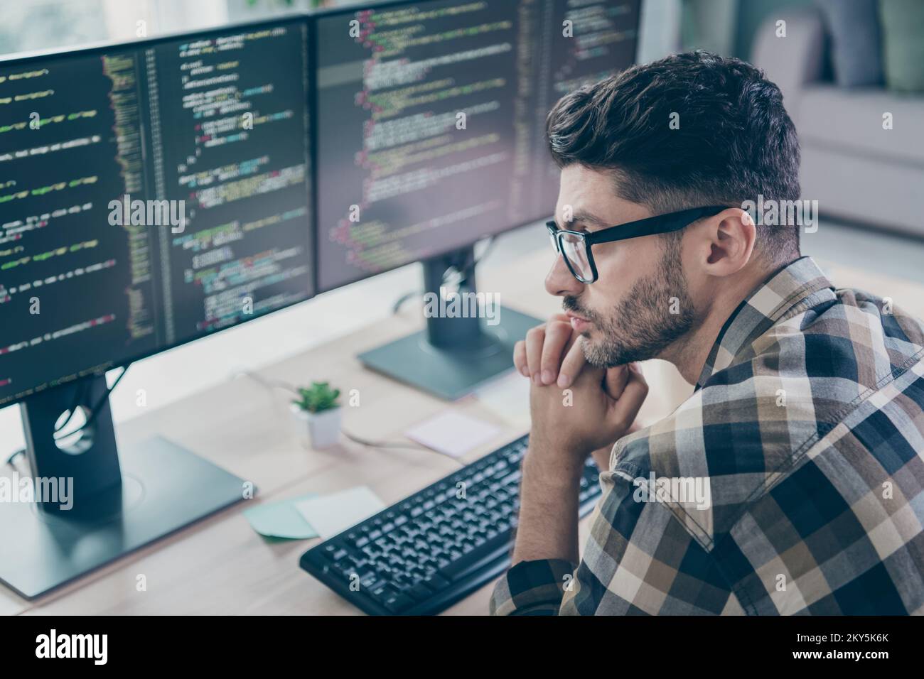 Photo of smart minded programmer wear spectacles arms hands chin ...
