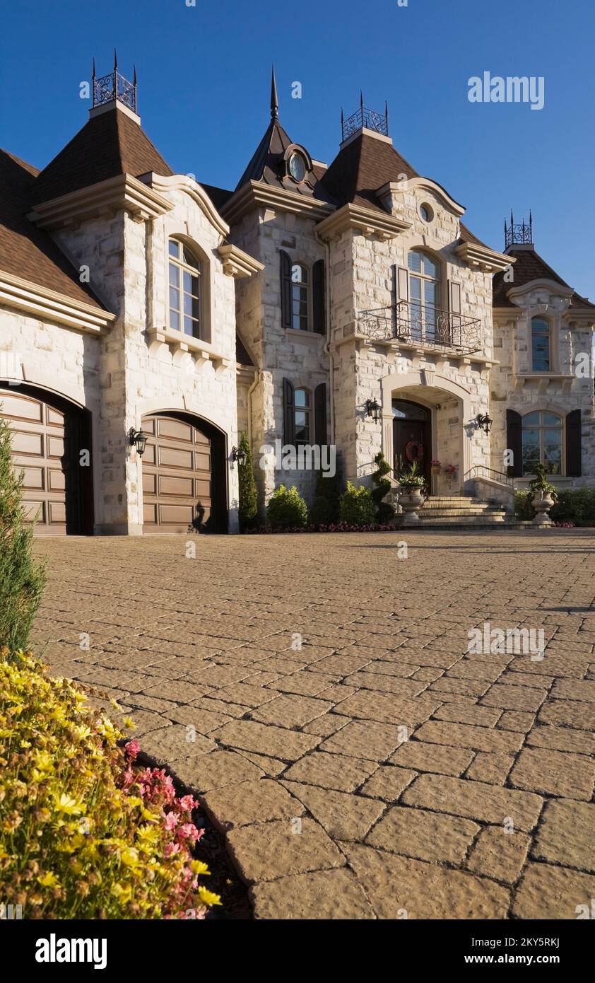 Luxurious two story home with two car garage, landscaped front yard and ...