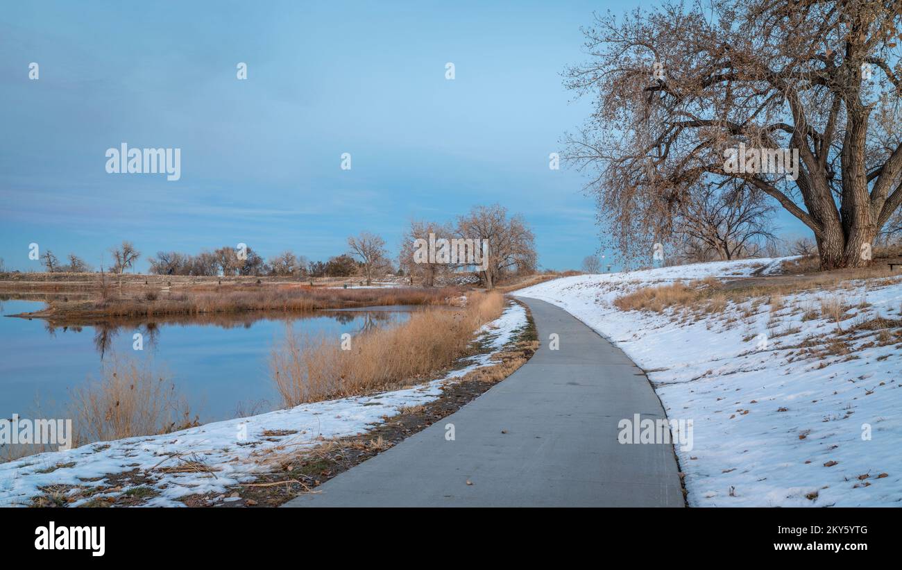 November dusk over a bike trail - South Platte River Trail near Brighton in northern Colorado ...