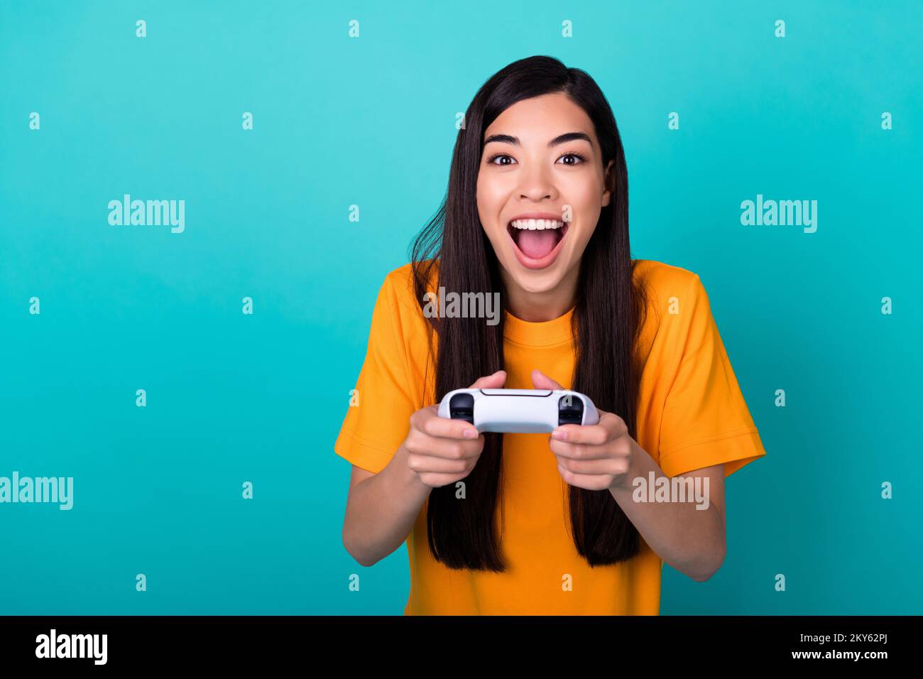 Photo of hooray brunette long hairstyle lady playstation wear yellow t ...