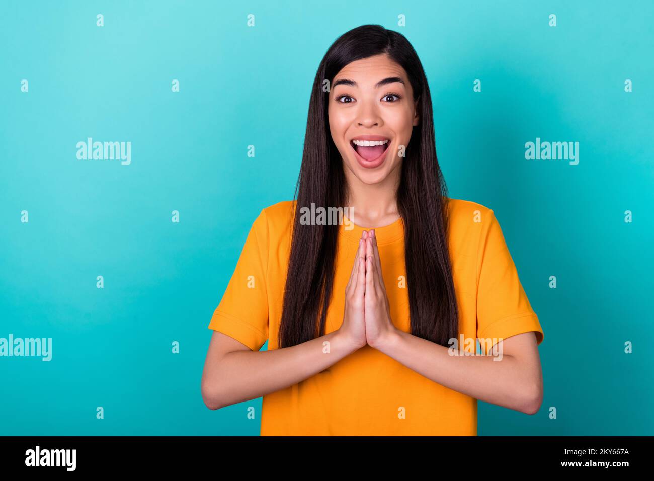 Photo of hooray brunette long hairstyle lady hold arms wear yellow t ...