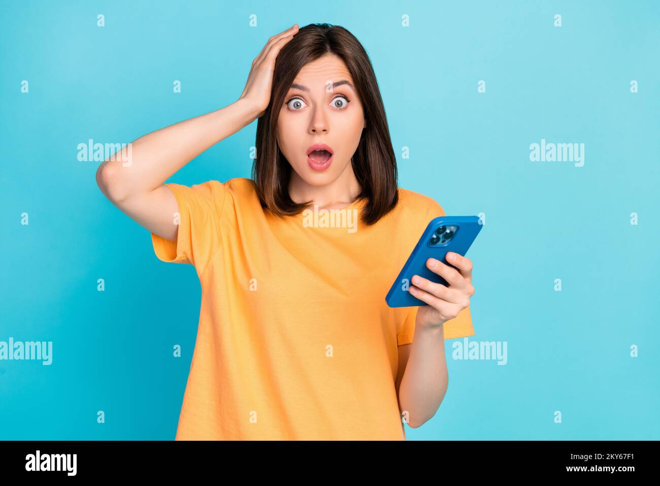 Photo of confused speechless person arm touch head open mouth hold ...