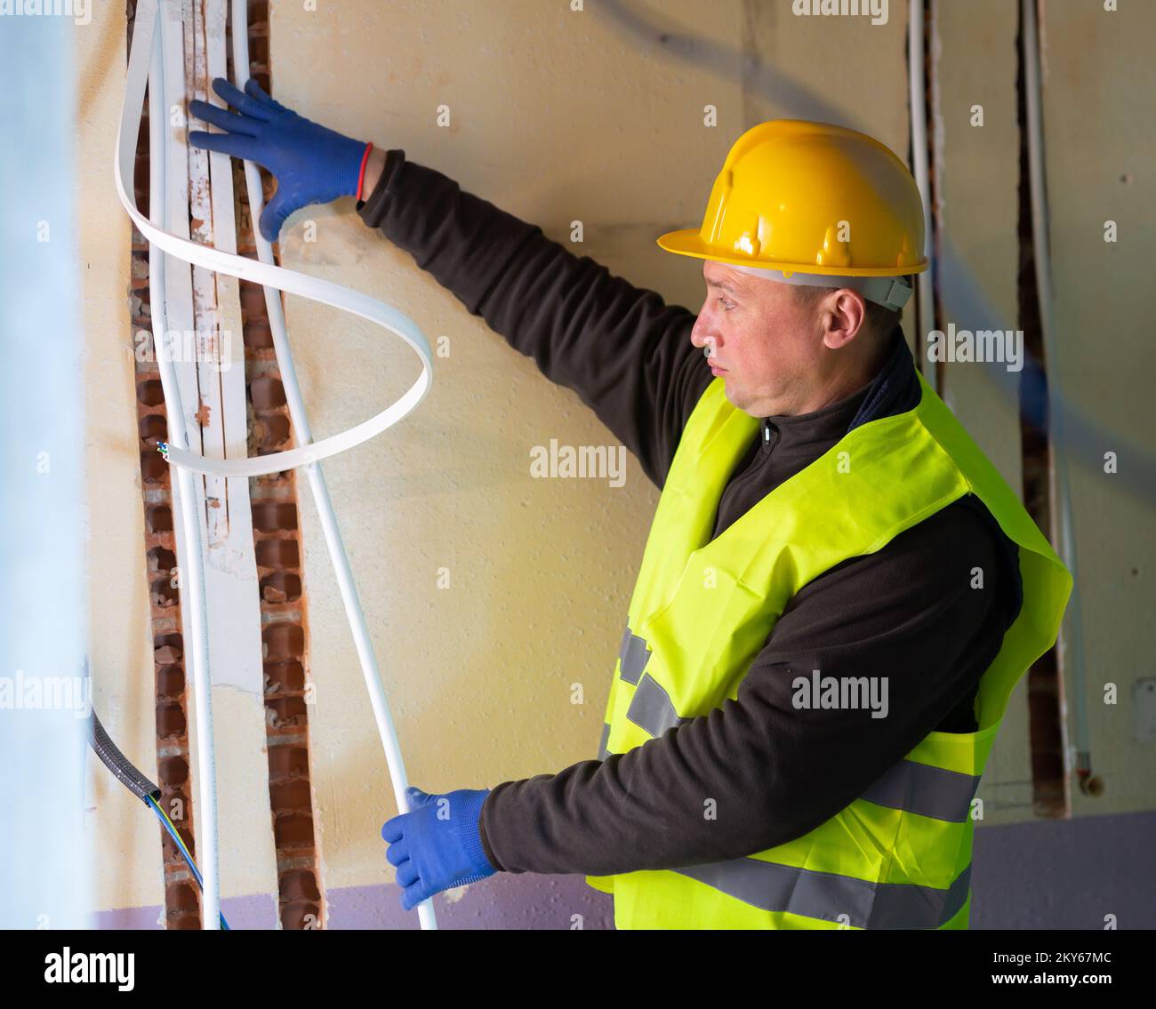 Repair man cable duct hi-res stock photography and images - Alamy