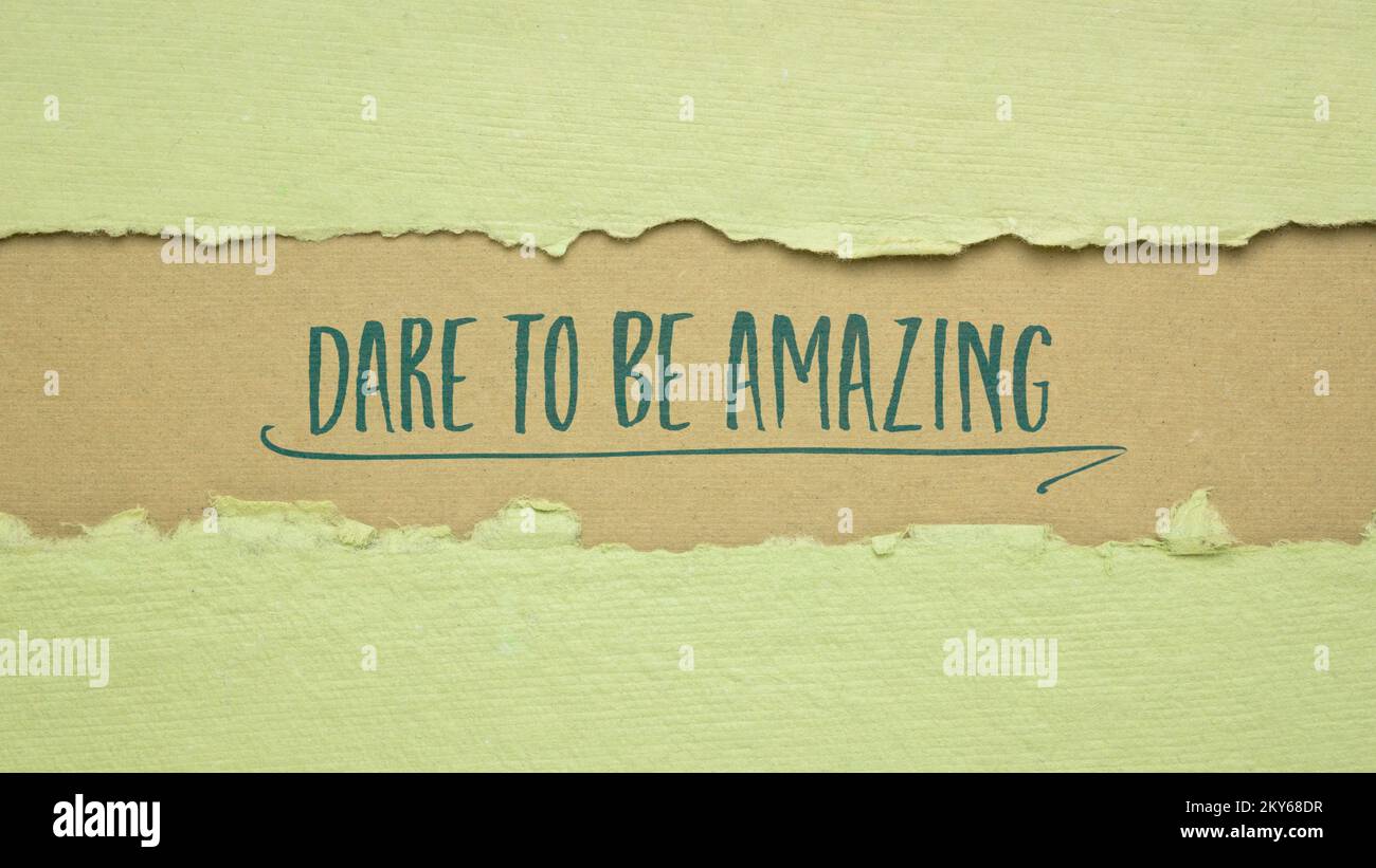 Dare to be amazing - motivational handwriting on a texture paper, web ...