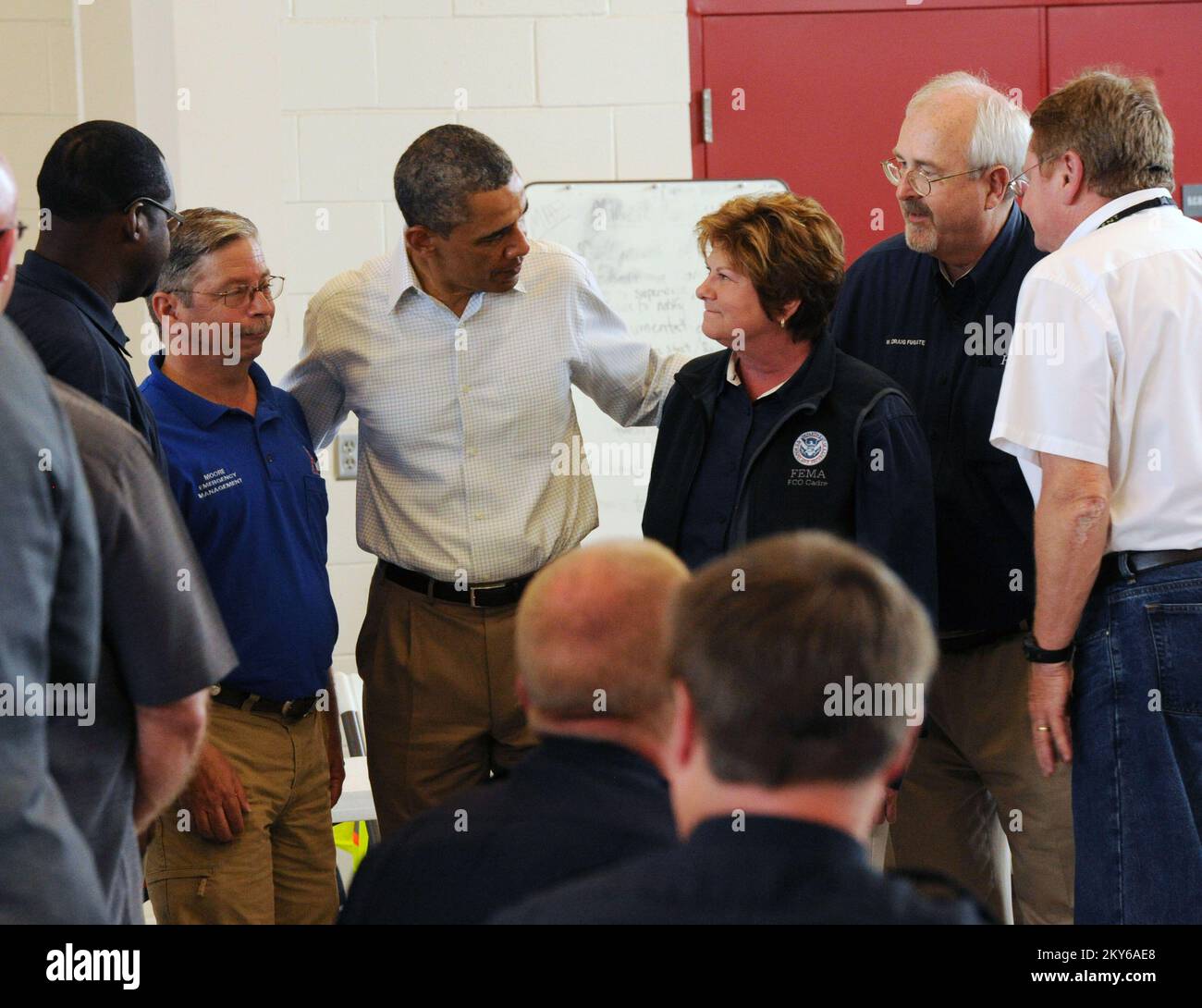 Moore, Okla., May 26, 2013 President Barack Obama, center, speaks with ...