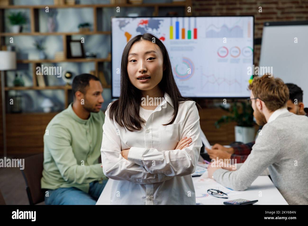 Confident happy smiling diverse asian woman, startup team leader ...