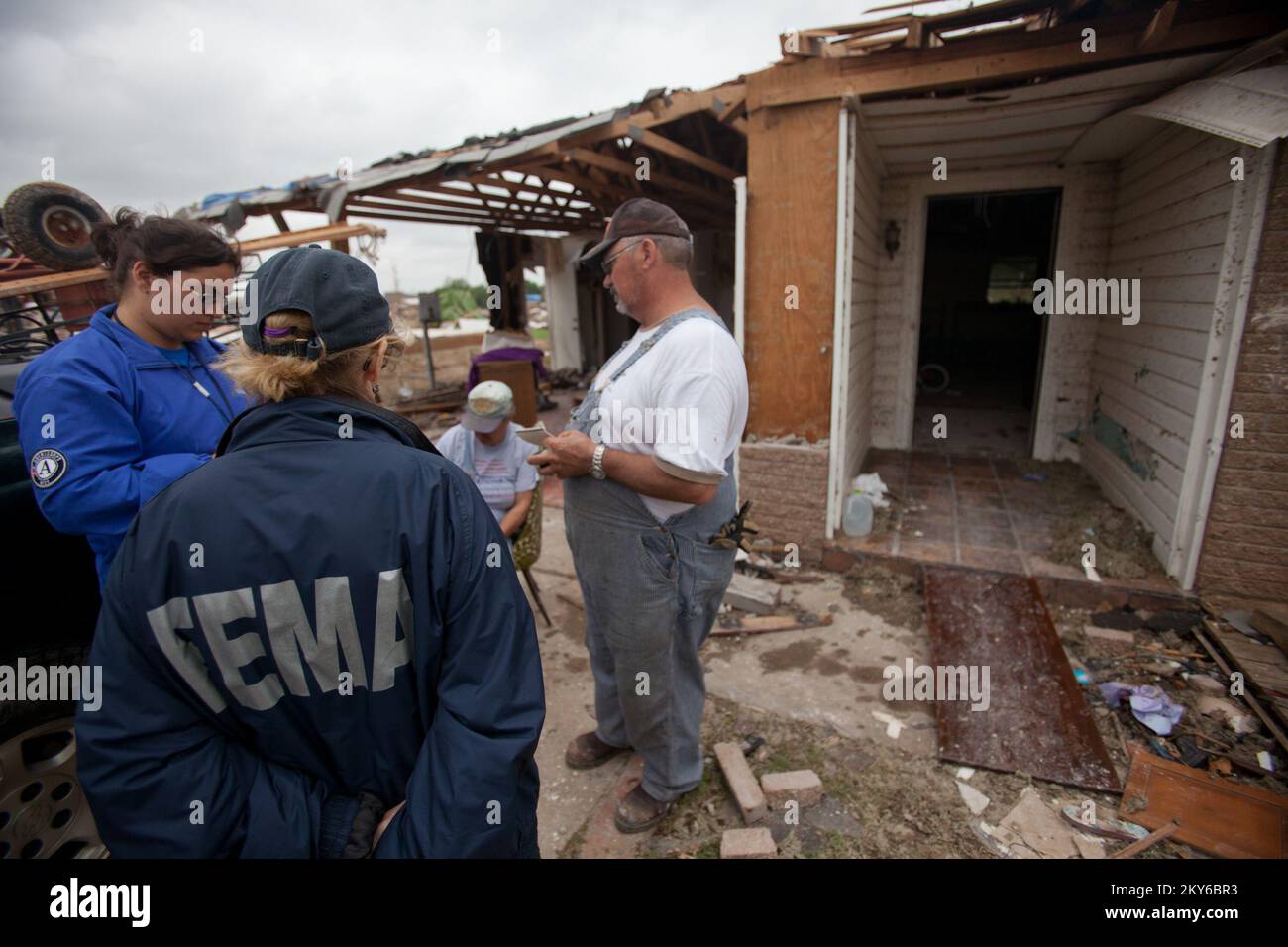 Moore, Okla., May 27, 2013 FEMA Corps member, Ana Canizales registers a ...