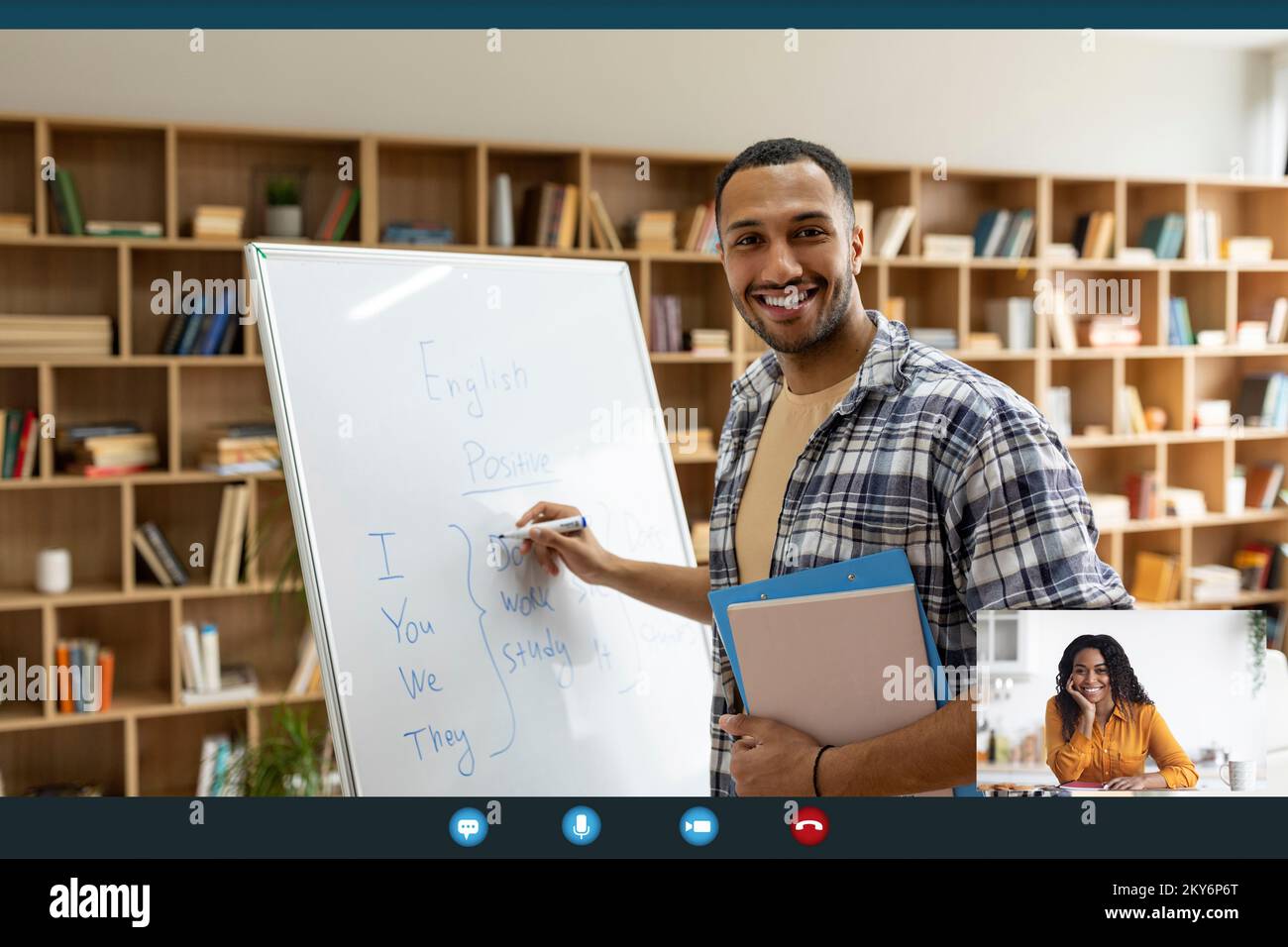 Online class. Young man and woman having web conference on laptop, male ...