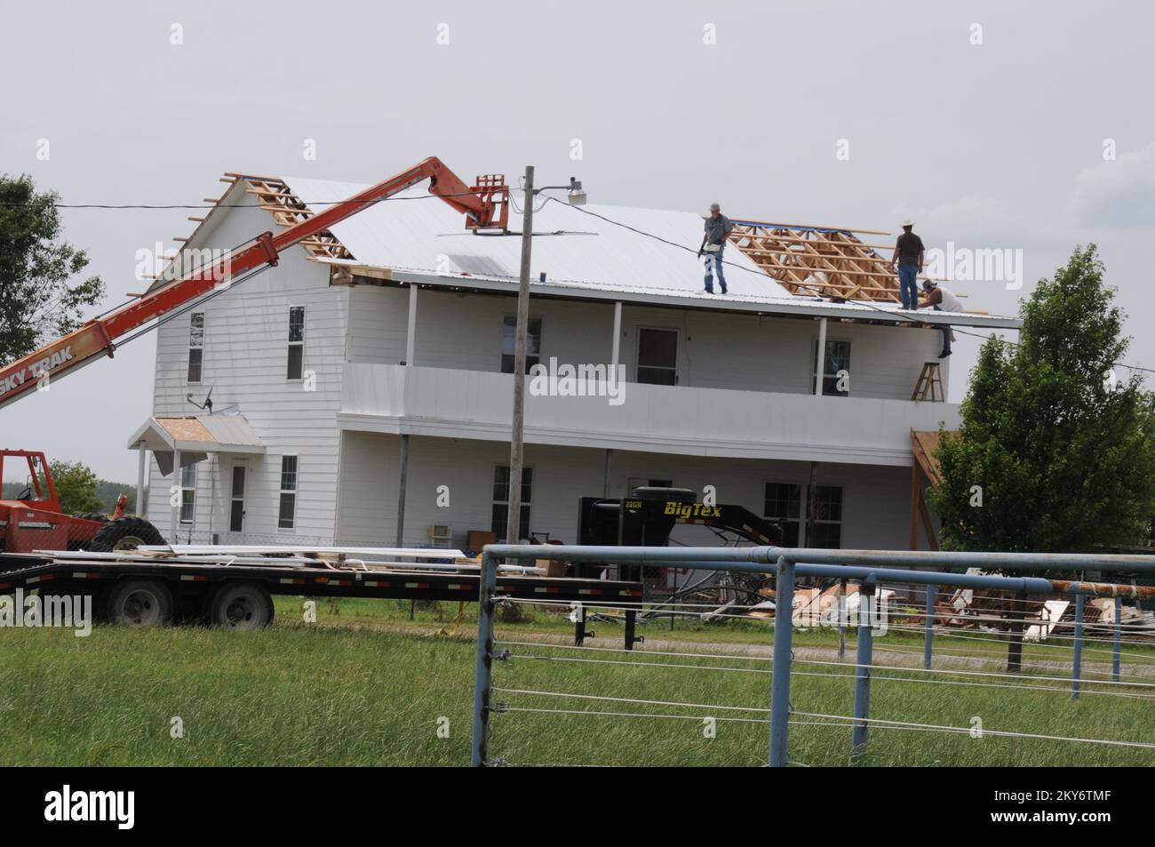 Recovery Underway with New Roof for Damaged Home.. Photographs Relating ...