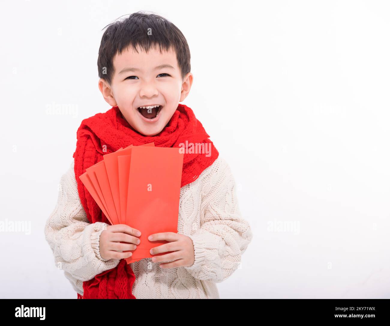 Excited Asian boy showing and holding many of red envelope . Happy ...