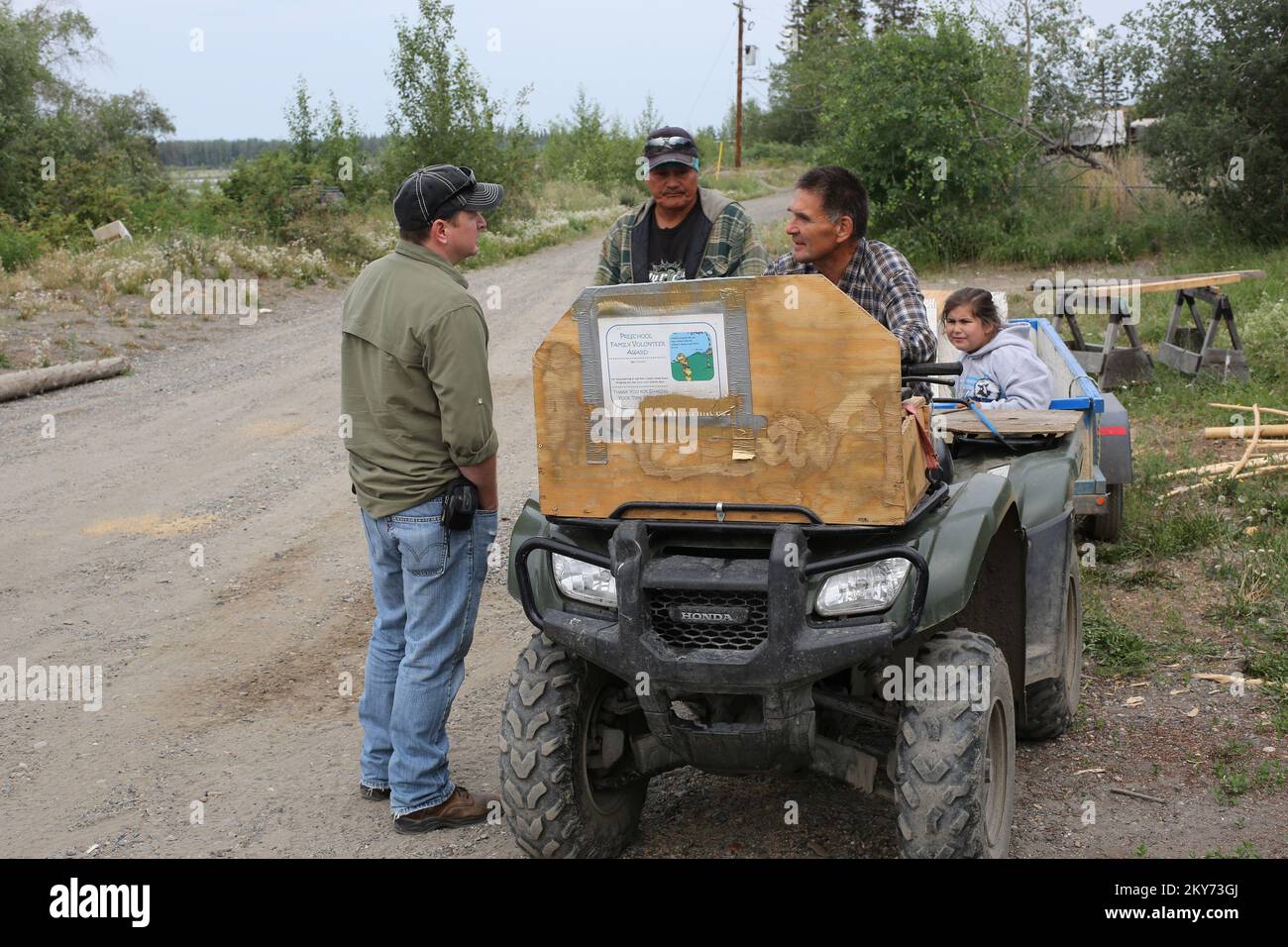 Fort Yukon, Alaska, July 6, 2013 FEMA inspectors record damages and ...