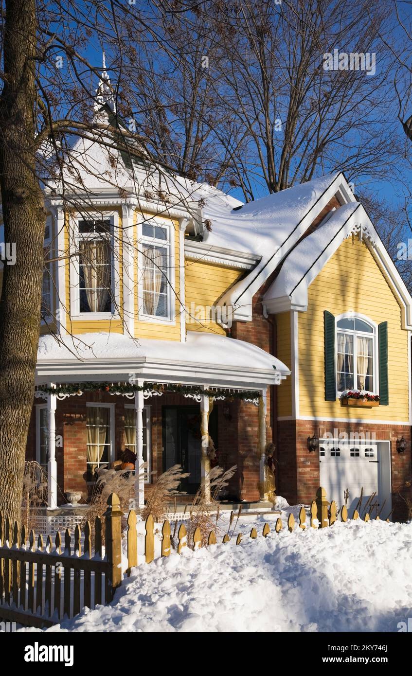 Two story yellow house porch hi-res stock photography and images - Alamy