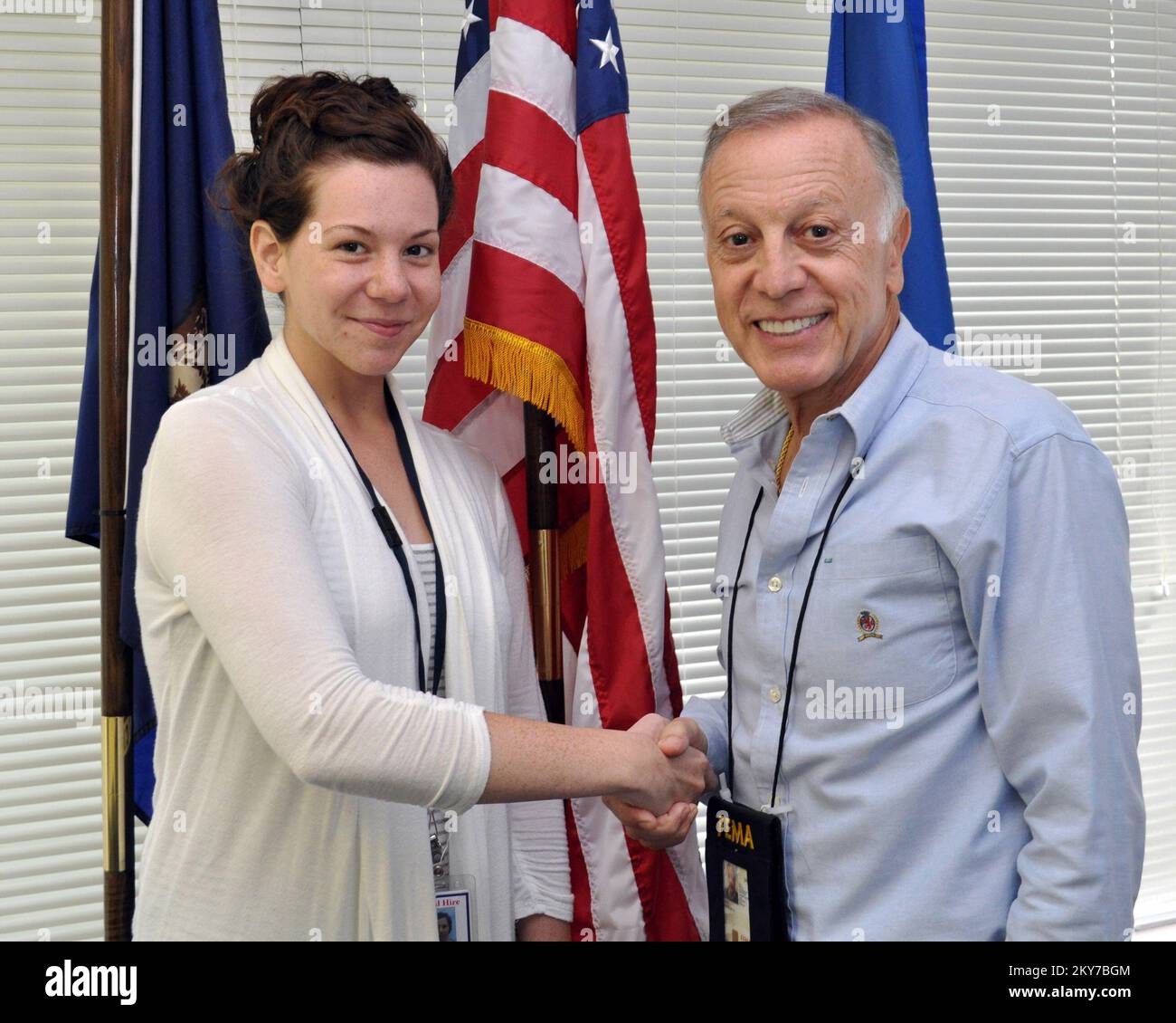 A Former FEMA Corps Member is Sworn In as a Local Hire.. Photographs ...