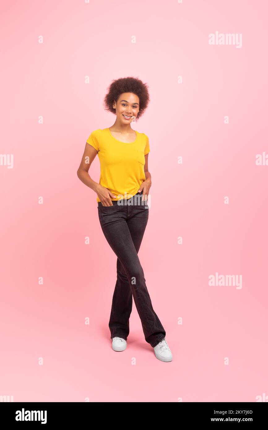 Happy pretty millennial african american curly lady student in casual ...