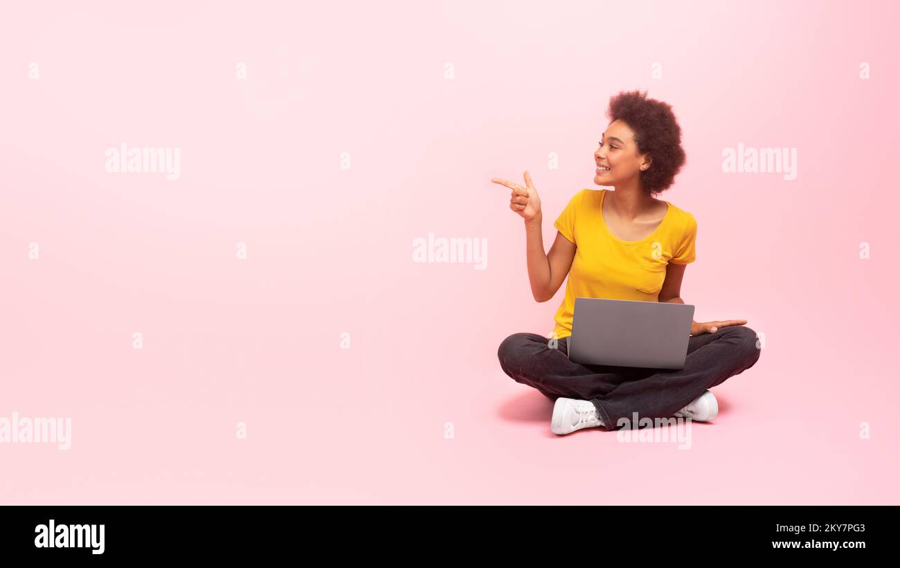 Happy millennial african american curly lady student in casual sit on ...