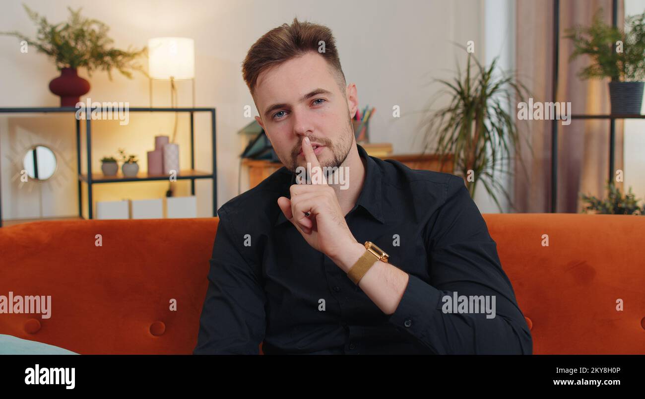 Shh be quiet please. Portrait of caucasian bearded man presses index ...