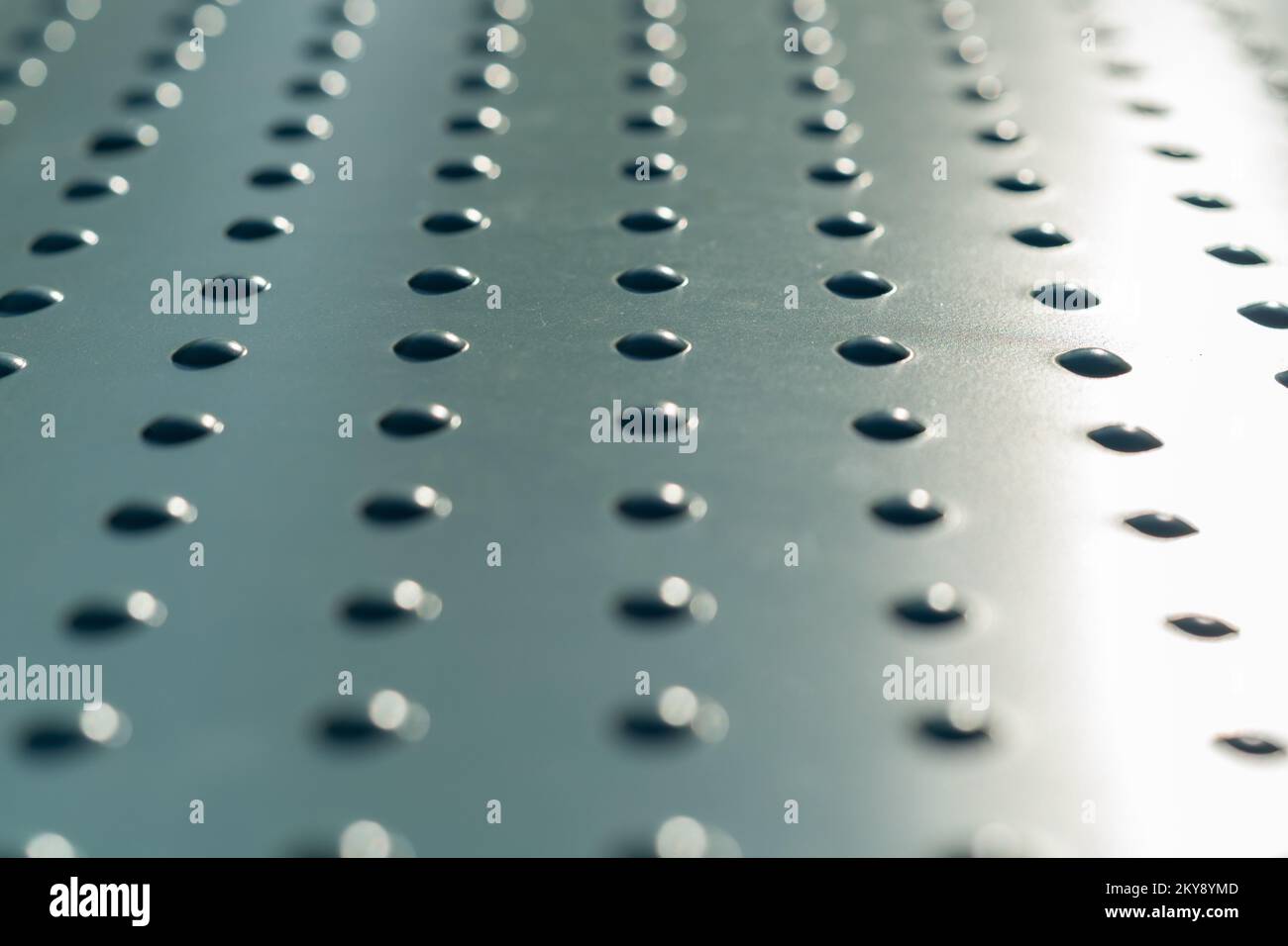 An abstract metal texture with raised bumps Stock Photo - Alamy
