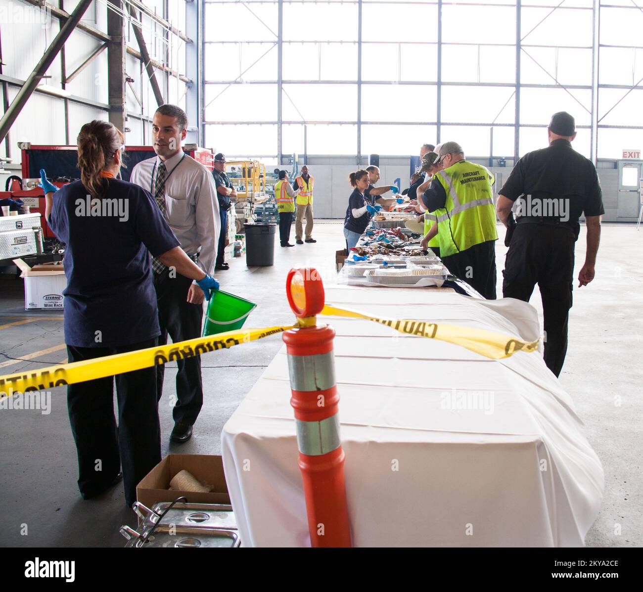 "Workers line up for lunch at the Massport Safety Fair, held in the ...