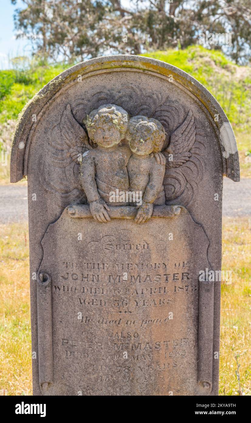 Grave headstone with two angels Stock Photo - Alamy