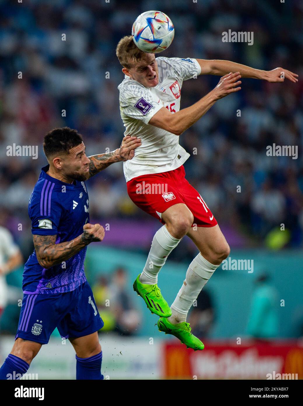 Karol Swiderski of Poland jumps for the ball during the FIFA World Cup ...