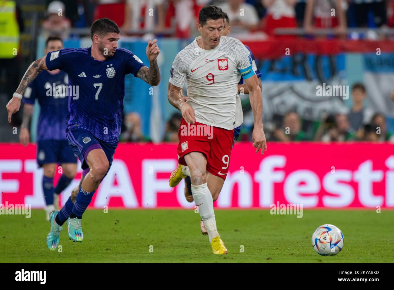 Robert Lewandowski of Poland and Rodrigo De Paul of Argentina during ...